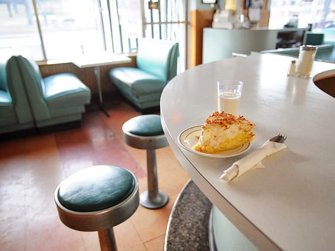 Counter seating where strangers become friends over shared appreciation for exceptional breakfast done the right way.
