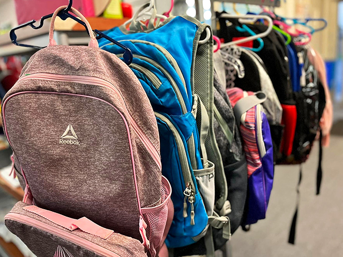 Backpacks lined up like eager students, ready for second chances at carrying homework, lunches, and teenage secrets.