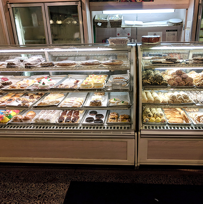 The bakery case – where willpower goes to die and "I'll just have a coffee" turns into "and one of those, and that, and..."