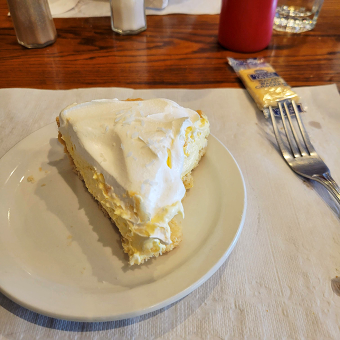 Cream pie with a cloud of meringue so light and airy it seems to defy both gravity and the laws of dessert physics.