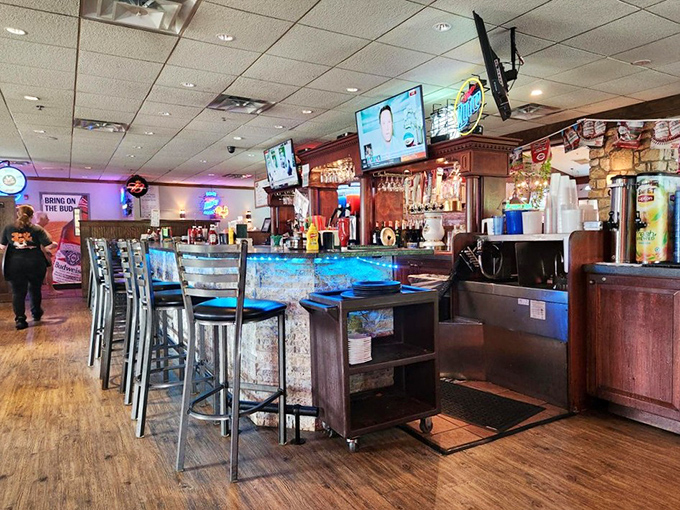 The bar area—where strangers become friends over shared appreciation of properly poured beers and Cincinnati sports debates.