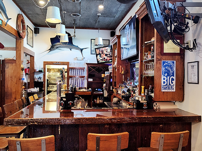 The bar where maritime dreams come true. That marlin on the wall has witnessed countless toasts to good catches&mdash;both seafood and blind dates.