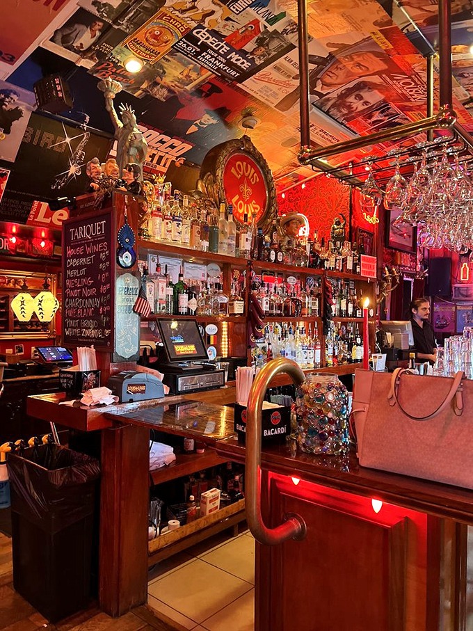 A bar that belongs in a museum of perfect drinking establishments, where bottles and memorabilia create a backdrop for memories waiting to happen.