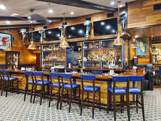 Not just a bar, but a maritime sanctuary where wood and blue come together to create the perfect backdrop for stories that improve with each telling.