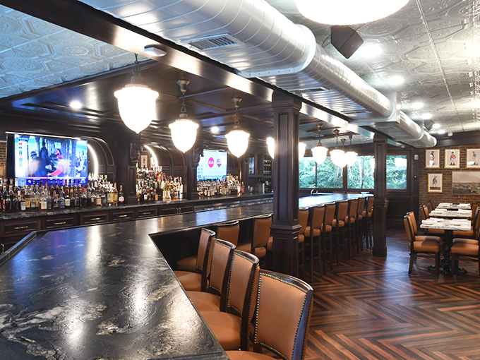 A proper bar with proper lighting where you can enjoy a proper drink before your proper meal arrives perfectly prepared.