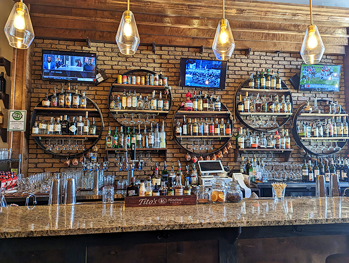 Behind this bar, mixologists craft liquid poetry while you debate ordering just one more dish.