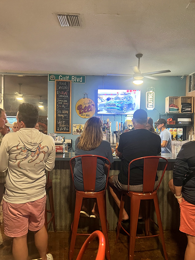 The bar area buzzes with a mix of locals and in-the-know tourists, all united by the universal language of "this grouper is worth writing home about."