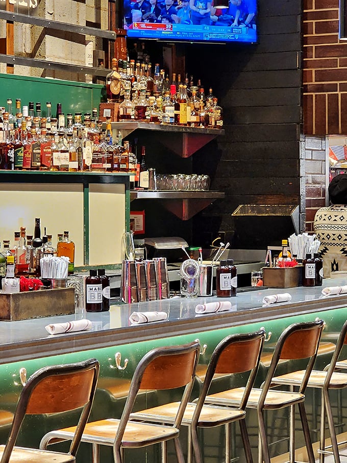 The bar at Mabel's isn't just stocked&mdash;it's an arsenal of liquid happiness, where bourbon bottles stand like soldiers ready to enhance your barbecue experience. 