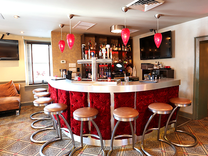 The bar's crimson accents and pendant lights create the perfect mood for everything from first dates to "I've had a day" unwinding sessions.