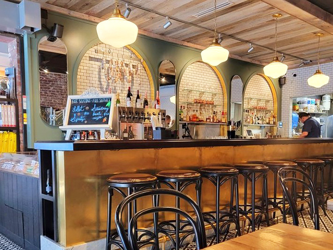 The bar area's arched mirrors reflect more than just bottles &ndash; they capture the essence of European caf&eacute; culture transported to Pennsylvania soil.