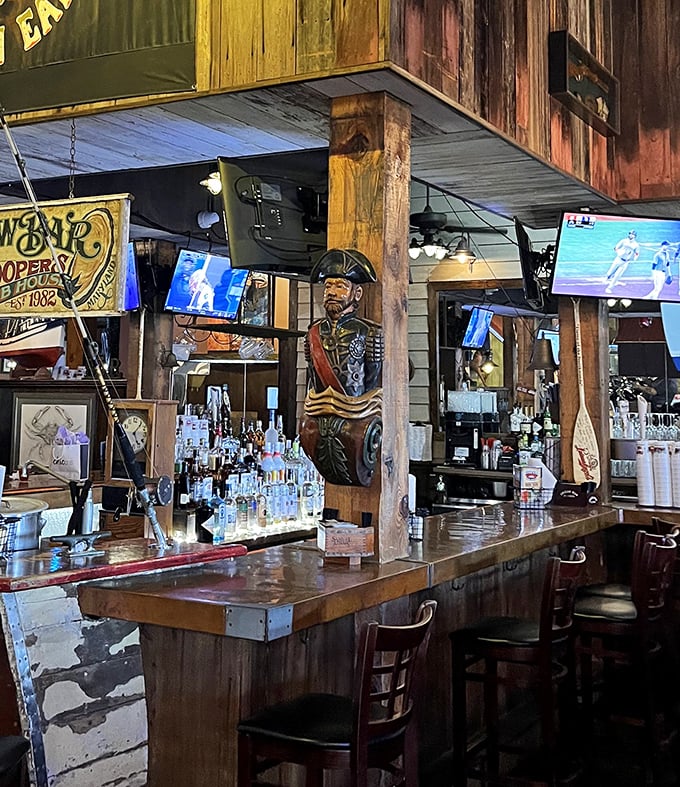 The bar area combines nautical nostalgia with fresh pours. Those wooden beams have witnessed countless vacation toasts and local celebrations.