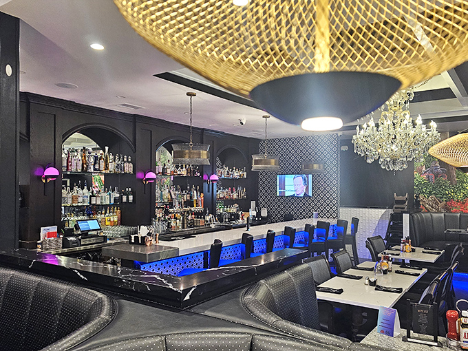 The bar area sparkles with enough glamour to make your mimosa feel like it's attending the Oscars.