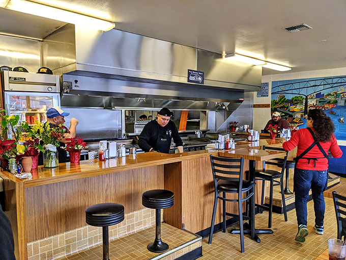 The counter seats offer front-row tickets to the best show in town: breakfast theater, where every flip and sizzle tells a delicious story.