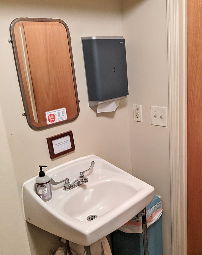 Even the bathroom has charm&mdash;a vintage mirror and simple sink. No detail overlooked in this temple to tastiness.