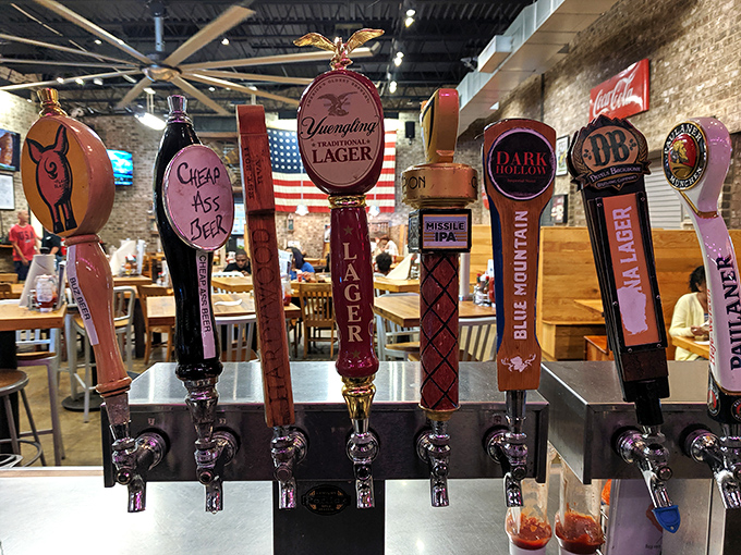 These colorful tap handles represent crucial decisions: which craft brew will best complement your mountain of meat and sides?