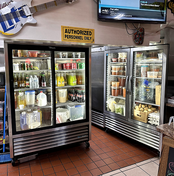 The beverage coolers &ndash; a colorful array of Mexican sodas and homemade sauces. That's not just inventory &ndash; it's liquid happiness waiting to be poured.