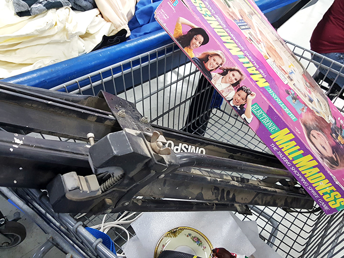 The "Mall Madness" board game peeking out feels symbolic&mdash;this is the anti-mall experience, where the madness is in the method, not the markup.