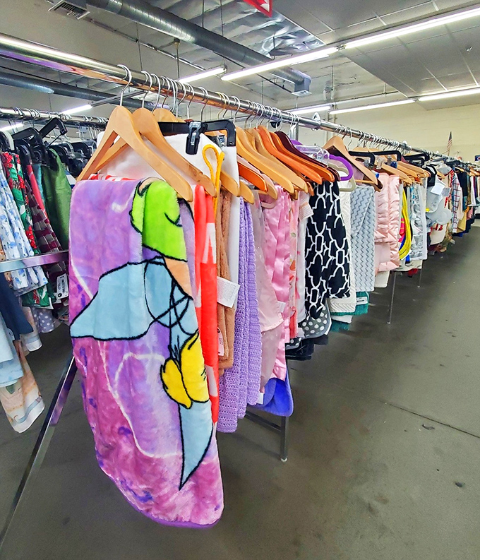 Clothing racks that prove one shopper's "so last season" becomes another's "vintage find." Fashion recycling at its most colorful.