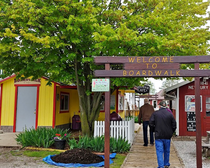 The boardwalk welcomes visitors to explore local shops selling goods that were actually made by humans, not assembly lines.