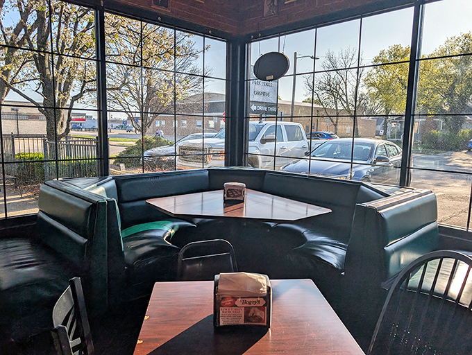 Classic diner booths where countless stories have been shared over mountains of comfort food and cold drinks.