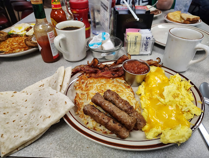A breakfast platter that answers the eternal question: "Why choose one breakfast meat when you can have them all?"