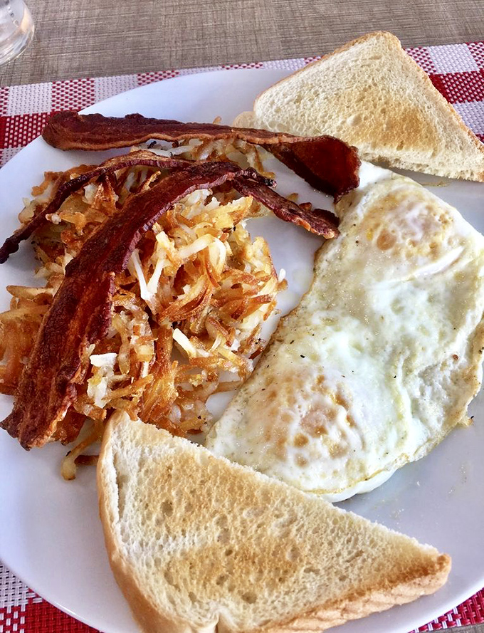 The breakfast platter that answers the eternal question: "Why choose?" Crispy hash browns, perfectly cooked eggs, and bacon that's both crisp and chewy.
