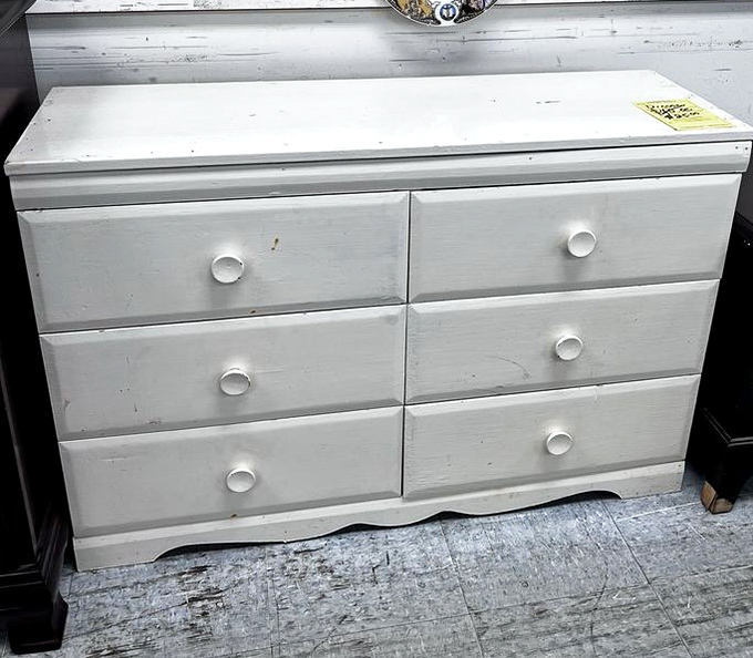 This white dresser isn't just storage—it's a blank canvas for your DIY dreams or perfect as-is for that guest room refresh you've been postponing.