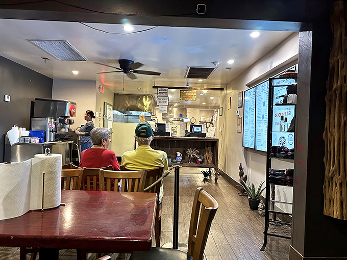 The ordering counter where culinary dreams come true, staffed by people who understand the responsibility of cultural preservation through food.