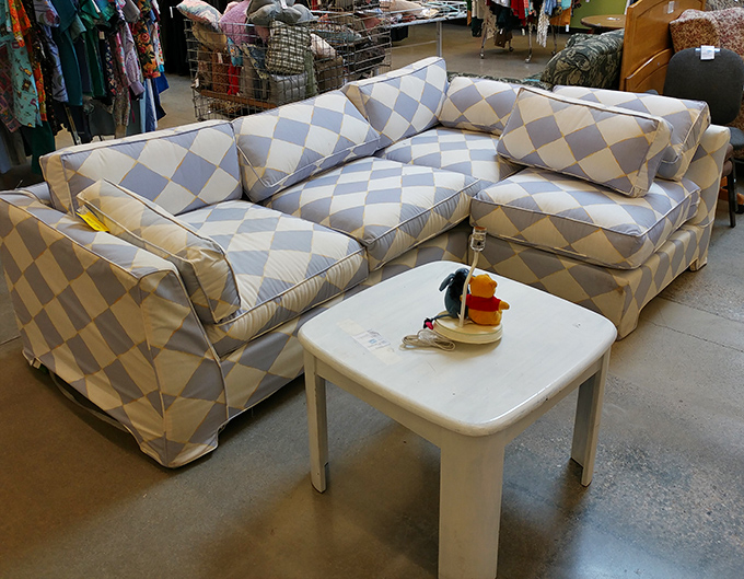 This blue checkered sectional is practically begging for a family movie night. Just add popcorn, blankets, and arguments about what to watch.