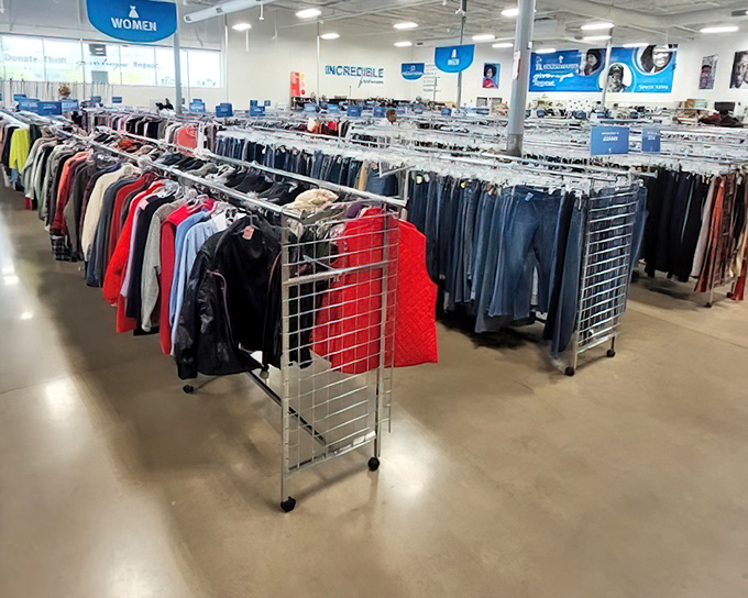 The pants section alone could clothe a small nation. Denim in every shade of blue known to mankind lines these industrial racks.