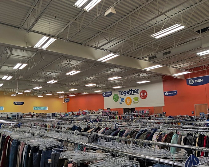 The children's section&mdash;where outgrown clothes find new purpose. Parents exchange knowing glances as they score back-to-school bargains.