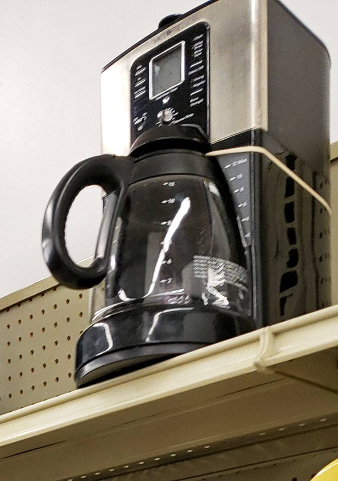 Yesterday's kitchen technology awaits resurrection. This coffee maker might have fueled an all-night session for the next great American novel.