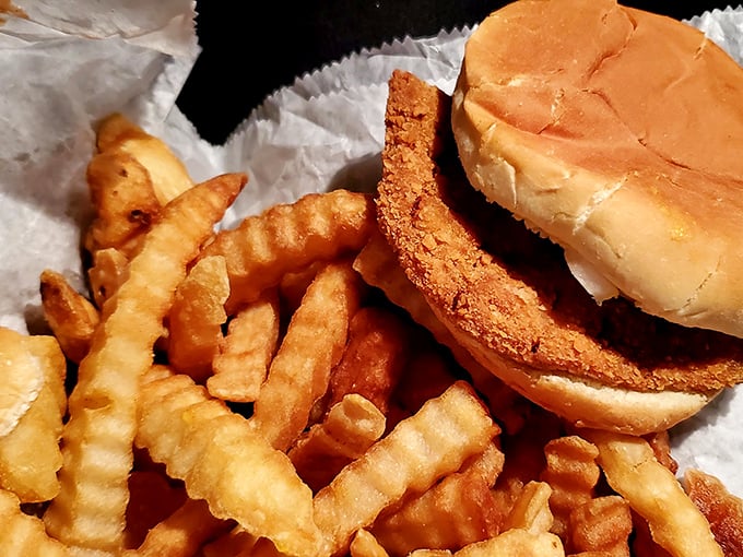 The holy trinity of diner food&mdash;crispy tenderloin, golden fries, and a soft bun. No filters needed for this kind of beauty.