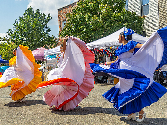 Traditional dancers bring vibrant swirls of color to Baltimore's cultural celebrations, their dresses creating temporary rainbows that even the most dedicated smartphone can't quite capture.