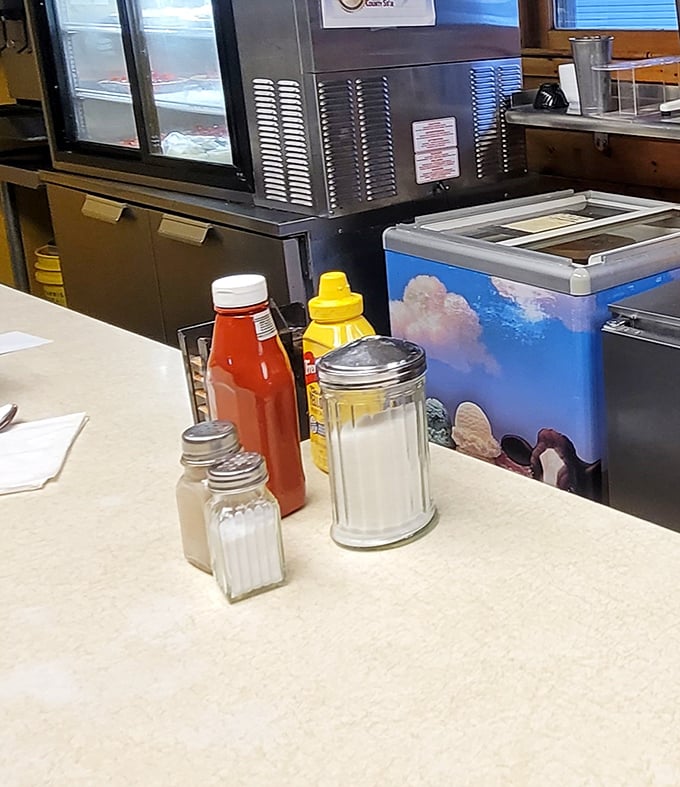The essentials of diner happiness&mdash;sugar, salt, ketchup, and mustard standing at attention, ready to enhance whatever deliciousness arrives.