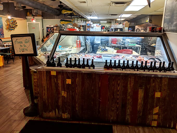 The seafood counter – where tomorrow's dinner meets today's lunch. Fresh catches displayed like jewels in a treasure chest.