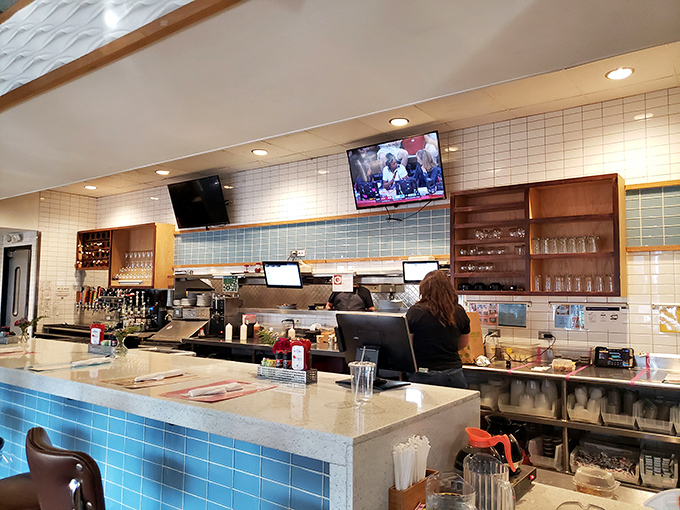 Behind the counter, culinary magic happens with the efficiency of a well-rehearsed orchestra.