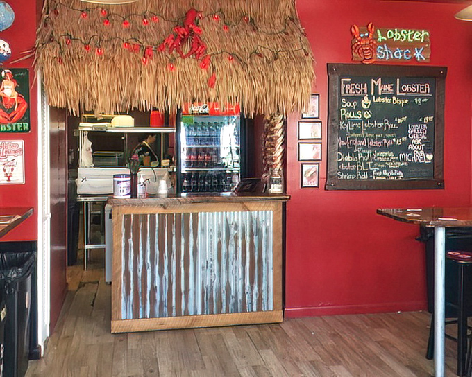 The tiki-inspired counter says "vacation" even if you're just on lunch break. That corrugated metal front is beach-industrial in the best possible way.