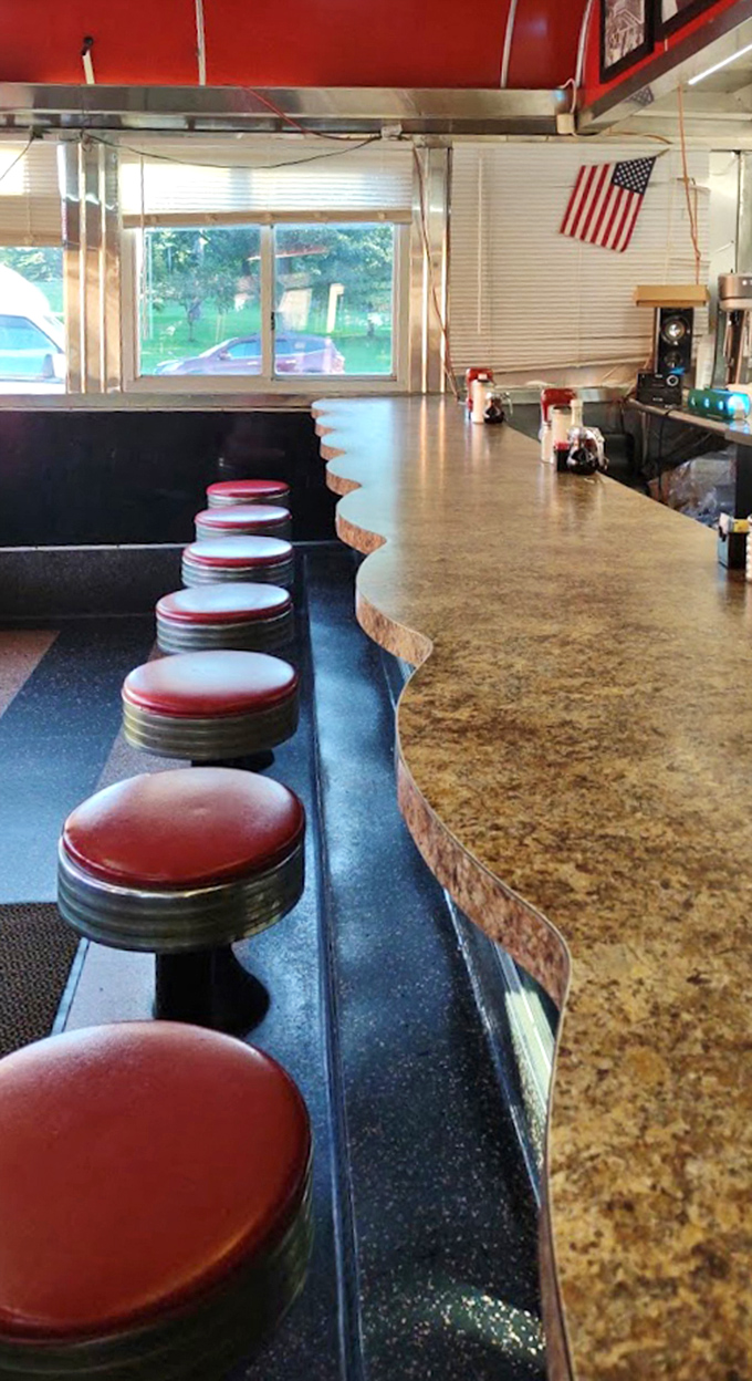 Red booths, counter seating, and that unmistakable diner energy. This isn't just eating&mdash;it's participating in an American tradition.