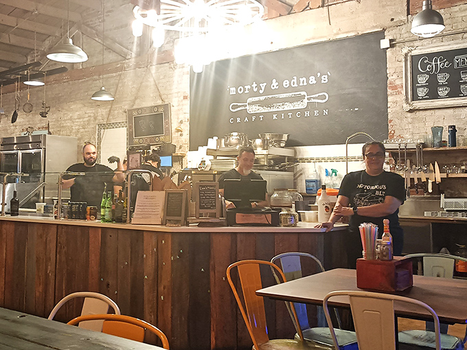 Behind the counter, where the magic happens &ndash; colorful stools invite you to watch the kitchen team transform simple ingredients into memorable meals.