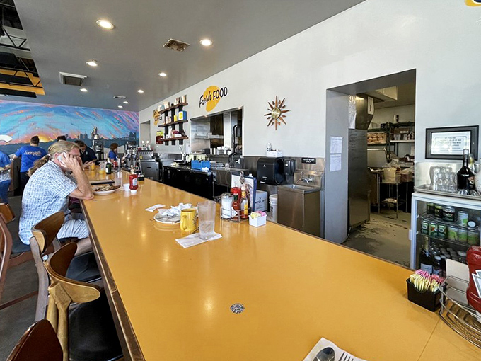 The counter experience&mdash;where coffee refills flow freely and you can watch breakfast magic happen while contemplating a second helping of bacon.