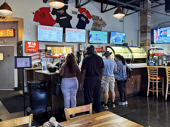 The ordering counter&mdash;where courage is tested, heat levels are negotiated, and Nashville's spiciest rite of passage begins.