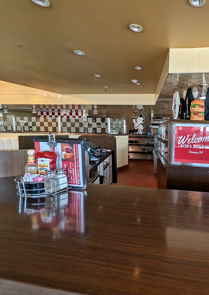 The dining room balances retro charm with modern comfort, where every table feels like the best seat in the house.