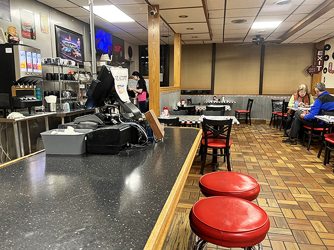 The counter experience &ndash; where red vinyl stools have witnessed more town gossip, first dates, and life decisions than any therapist's couch in Bedford.