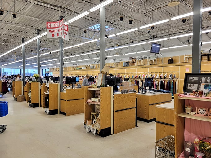 The checkout area: final destination for triumphant thrifters. Where friendly cashiers have seen it all, from vintage vinyl to that ceramic cat you didn't know you needed.