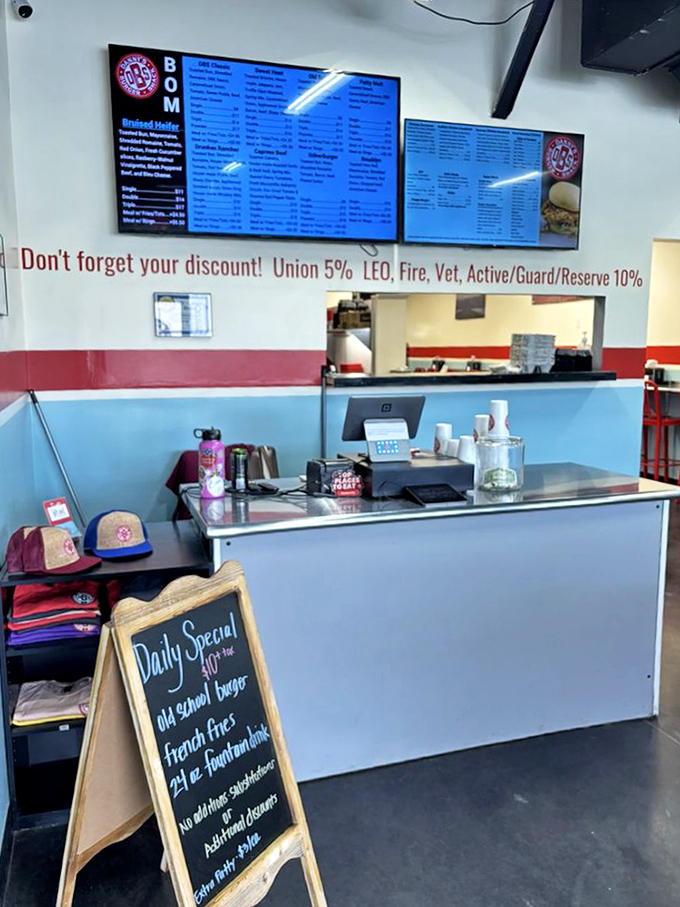The counter where burger dreams come true. That chalkboard special might just be the best decision you make all day.