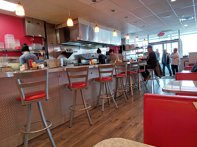 The counter seats&mdash;where breakfast theater unfolds and solo diners become part of the morning's choreographed culinary dance.