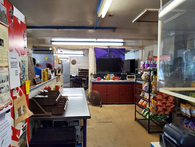 The ordering counter at Jake's&mdash;where BBQ dreams are born and hunger goes to surrender. No fancy digital displays, just human connection and meat magic. 