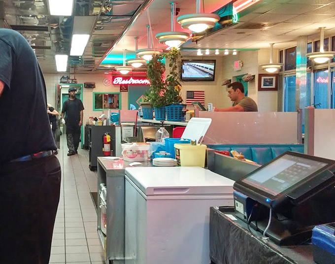 The counter view: where watching short-order cooks work their magic rivals any cooking show, minus the commercial breaks.