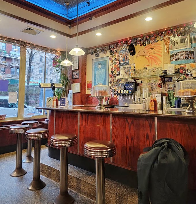 The counter at Tom's&mdash;where solo diners find community, coffee cups are never empty, and the stools have heard every New York story worth telling.